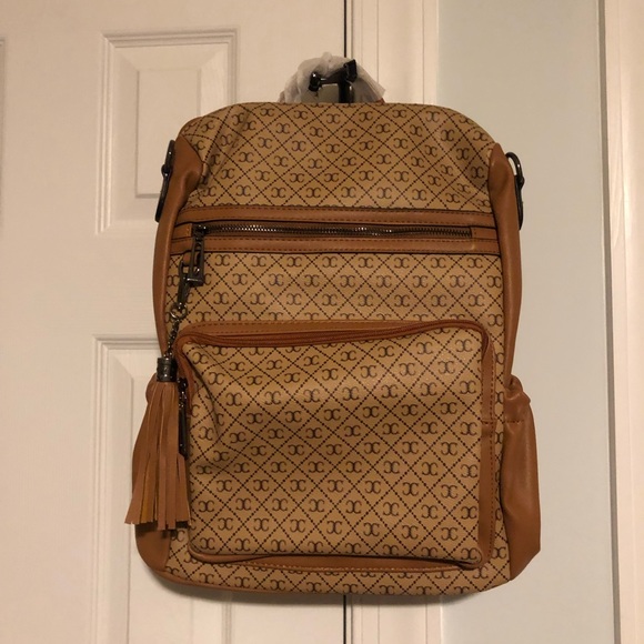 Bags | Nwt Brown Backpack With Cc Logo Never Been User Wrapping Still ...